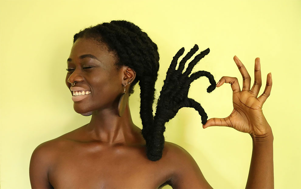 Ivorian Artist Sculpts Her Hair Into Hand Gestures In Stunning Photo ...
