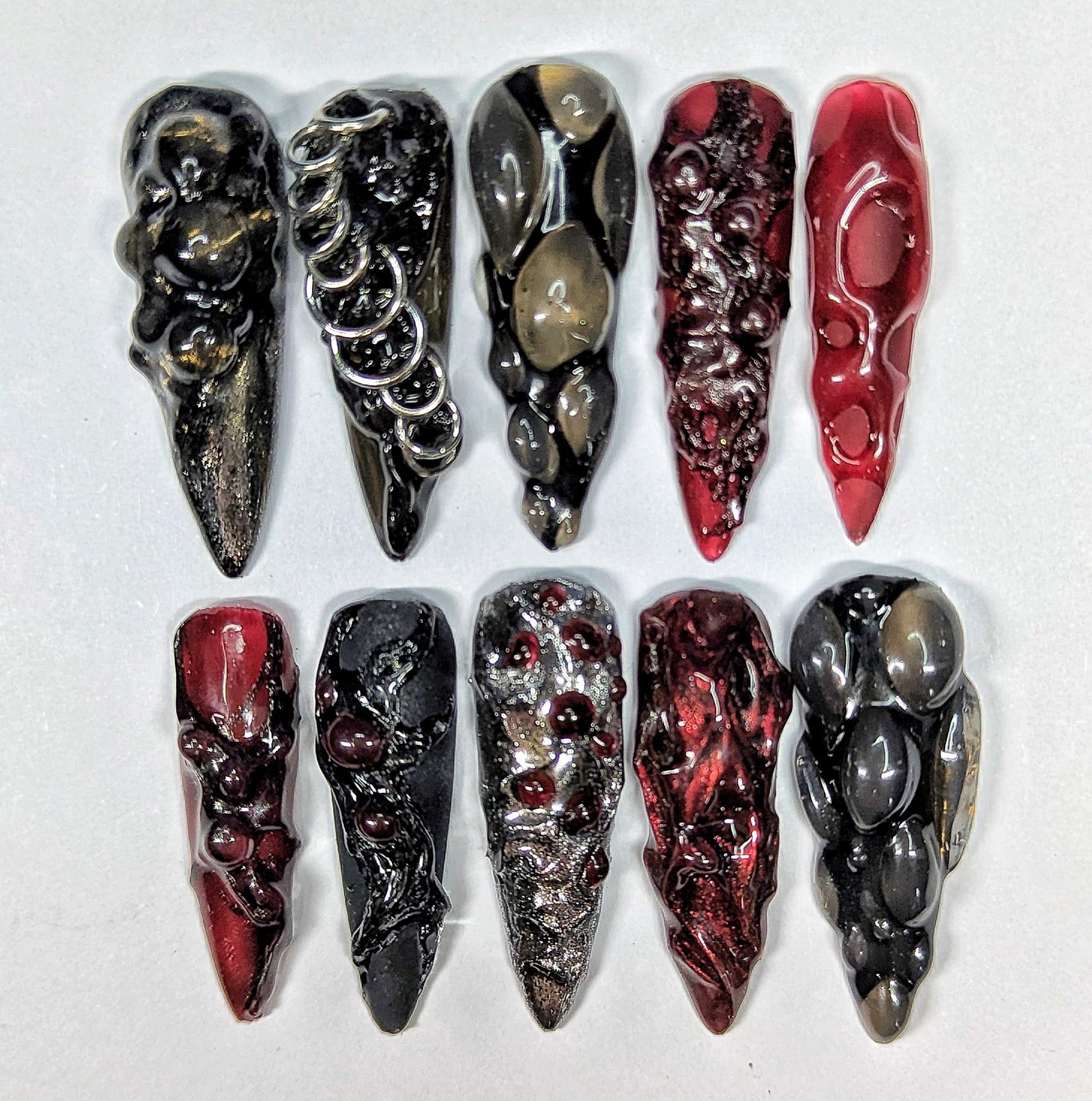 Artist Knife Angel Transforms Fake Nails into Dark, Macabre and Thought ...