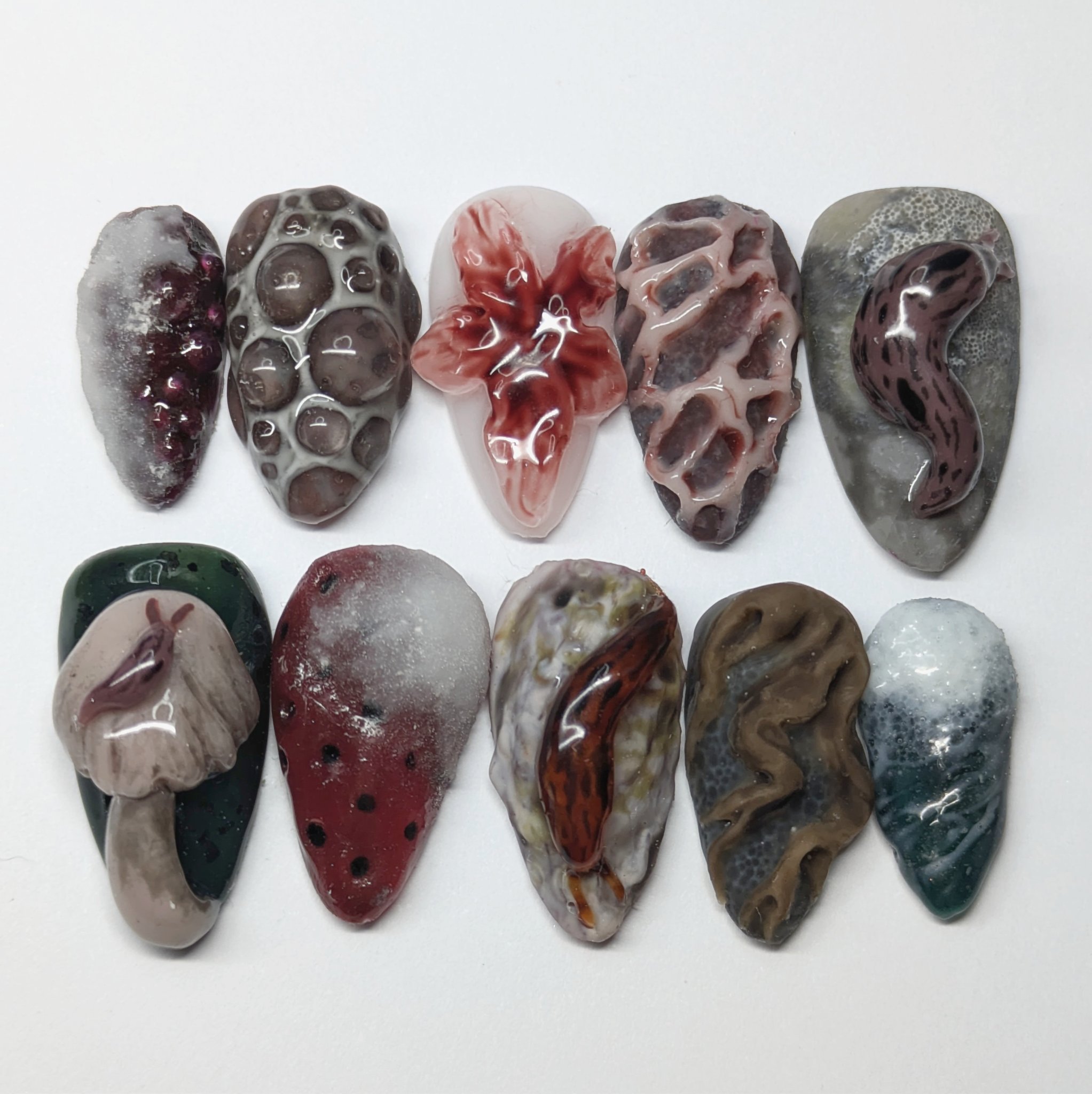 Artist Knife Angel Transforms Fake Nails into Dark, Macabre and Thought ...